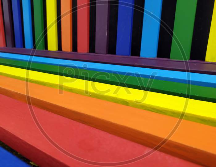 Image of Colorful bench with different shiny colors as symbol for ...