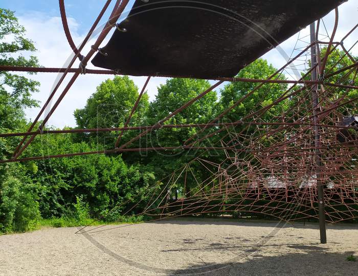 Image of High rope climbing frame on a playground in summer to ...