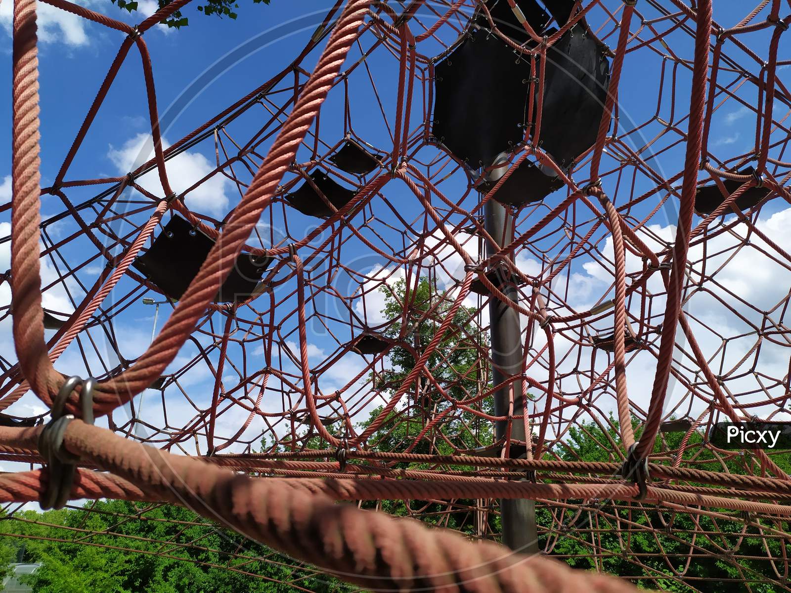 Image of High rope climbing frame on a playground in summer to ...