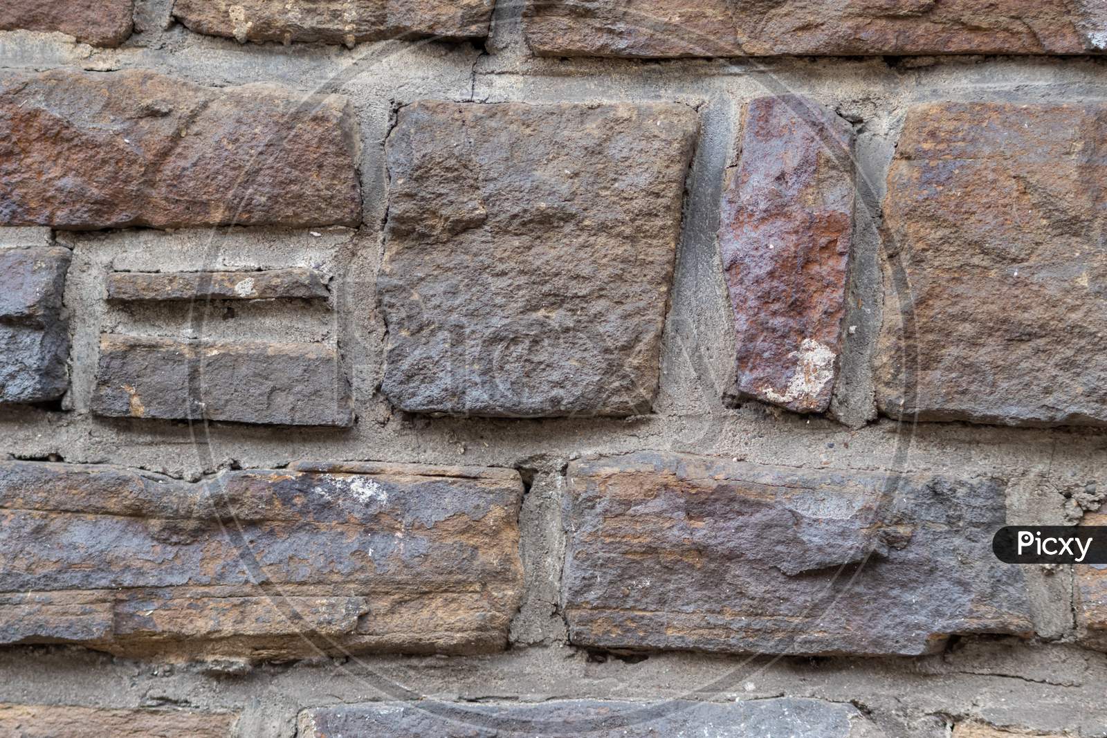 Image of Massive stone wall with rough rocks like a castle wall with ...