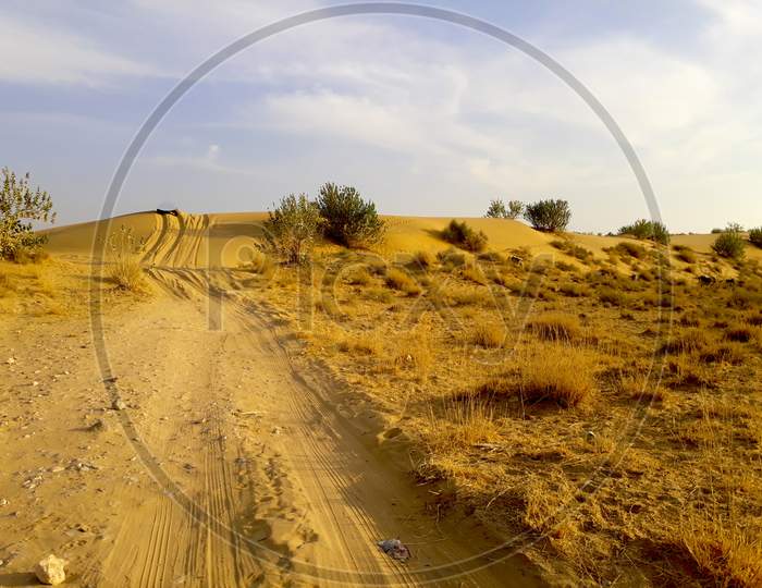 Image of A picture of open desert areas and sand dunes in Thar desert ...
