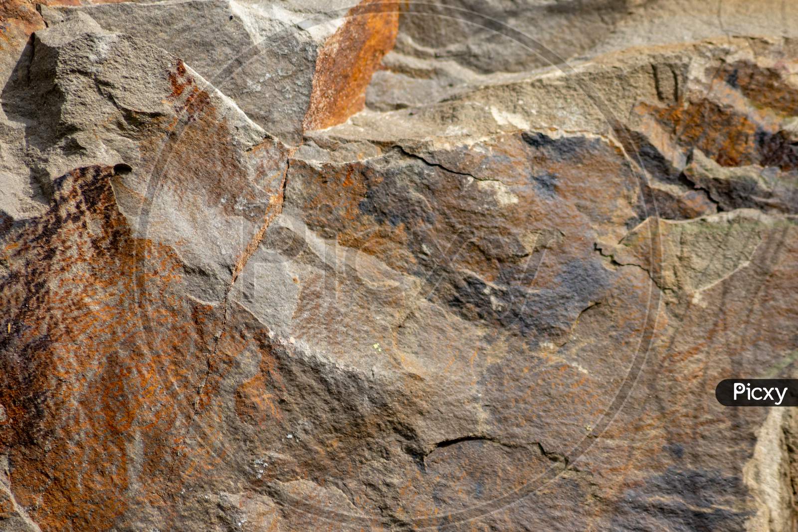 Image of Raw rock in orange with minerals and metals as natural stones ...