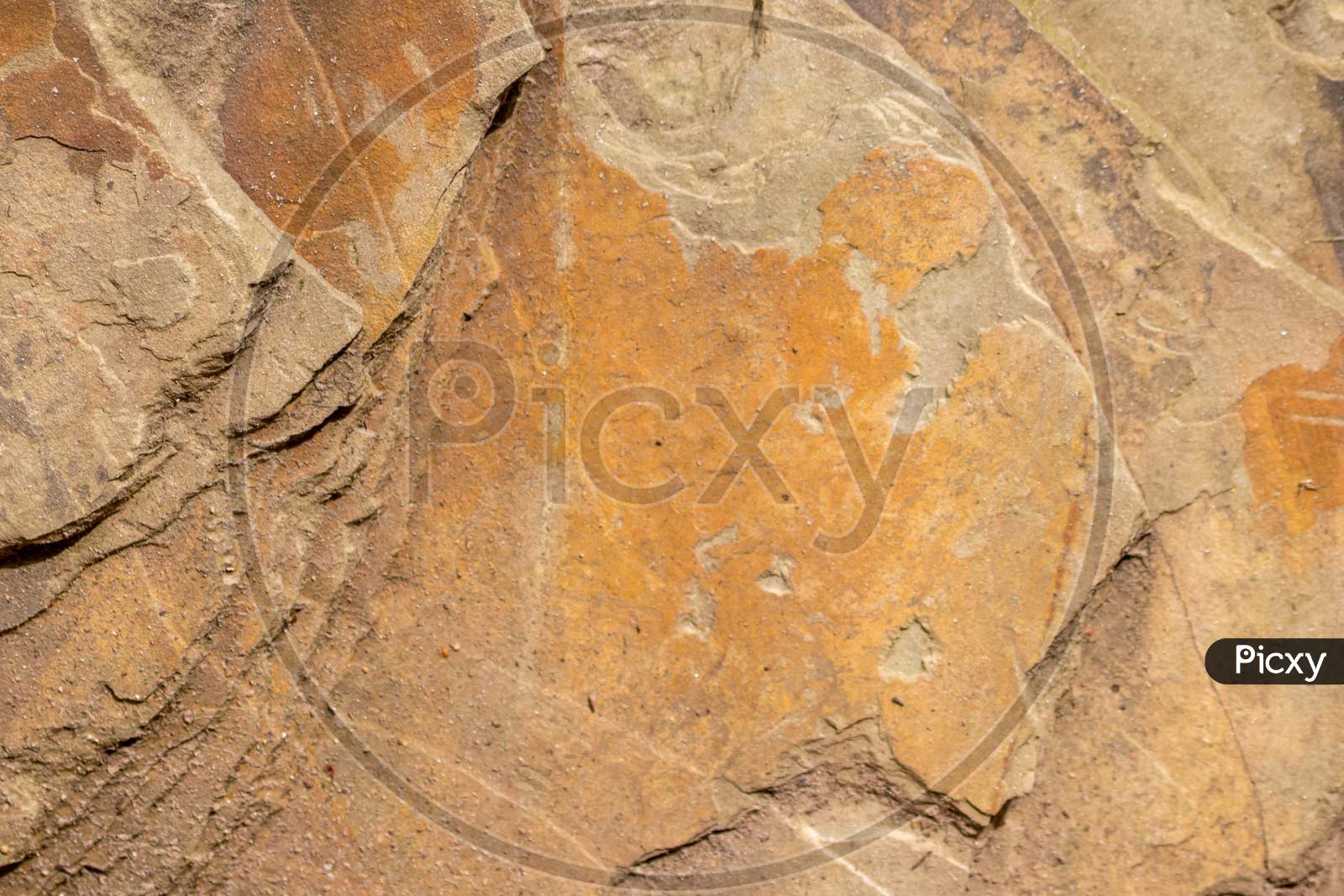 Image of Raw rock in orange with minerals and metals as natural stones ...