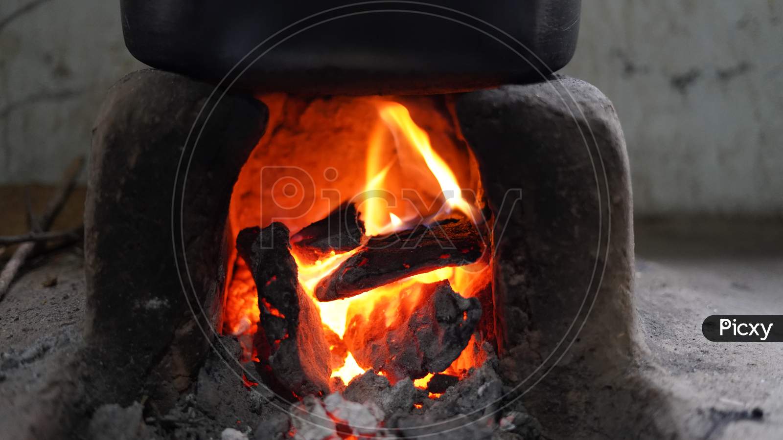 Image of Bright Reddish Fire View, Burning In Clay Stove, With Wooden ...