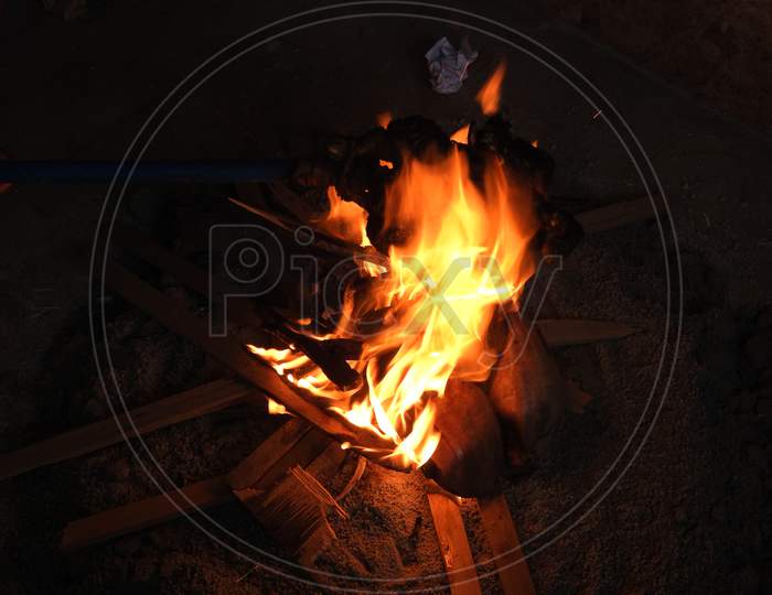 Image of Burning or grilled chicken making in a out house with wood ...
