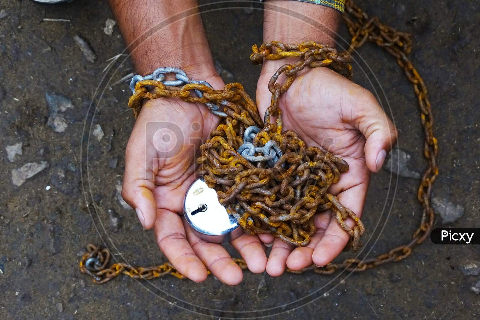 Image of Hands with chain wrapped around them-JG154267-Picxy