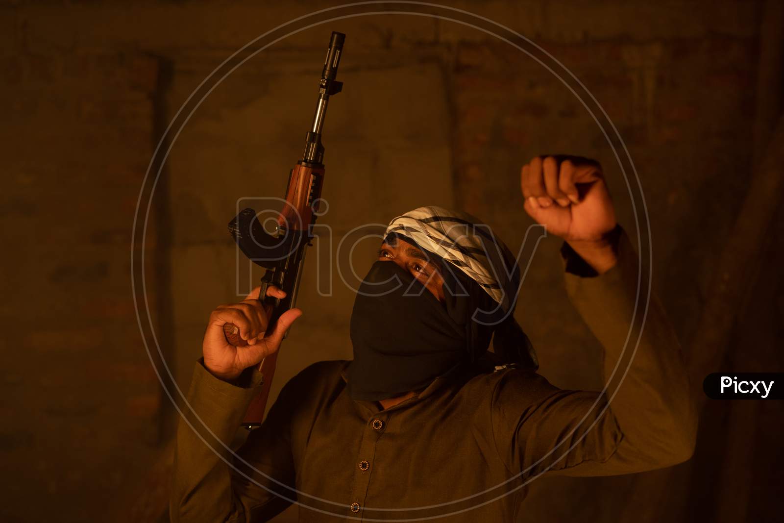 Image of Happy Islamic Militant Or Soldier With Face Cover Dancing With ...