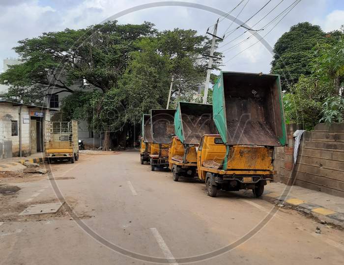 Image of Closeup of BBMP empty auto rickshaw container parking on ...