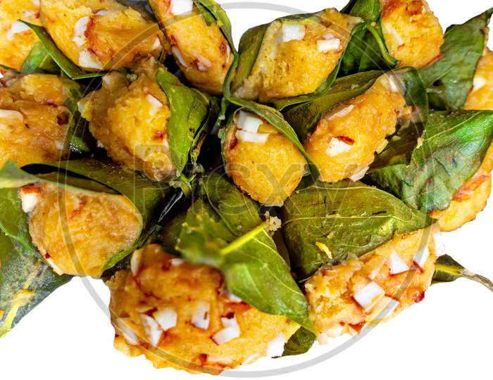 Image of Traditional steamed ripe palmyra palm fruit cake wrapped with ...