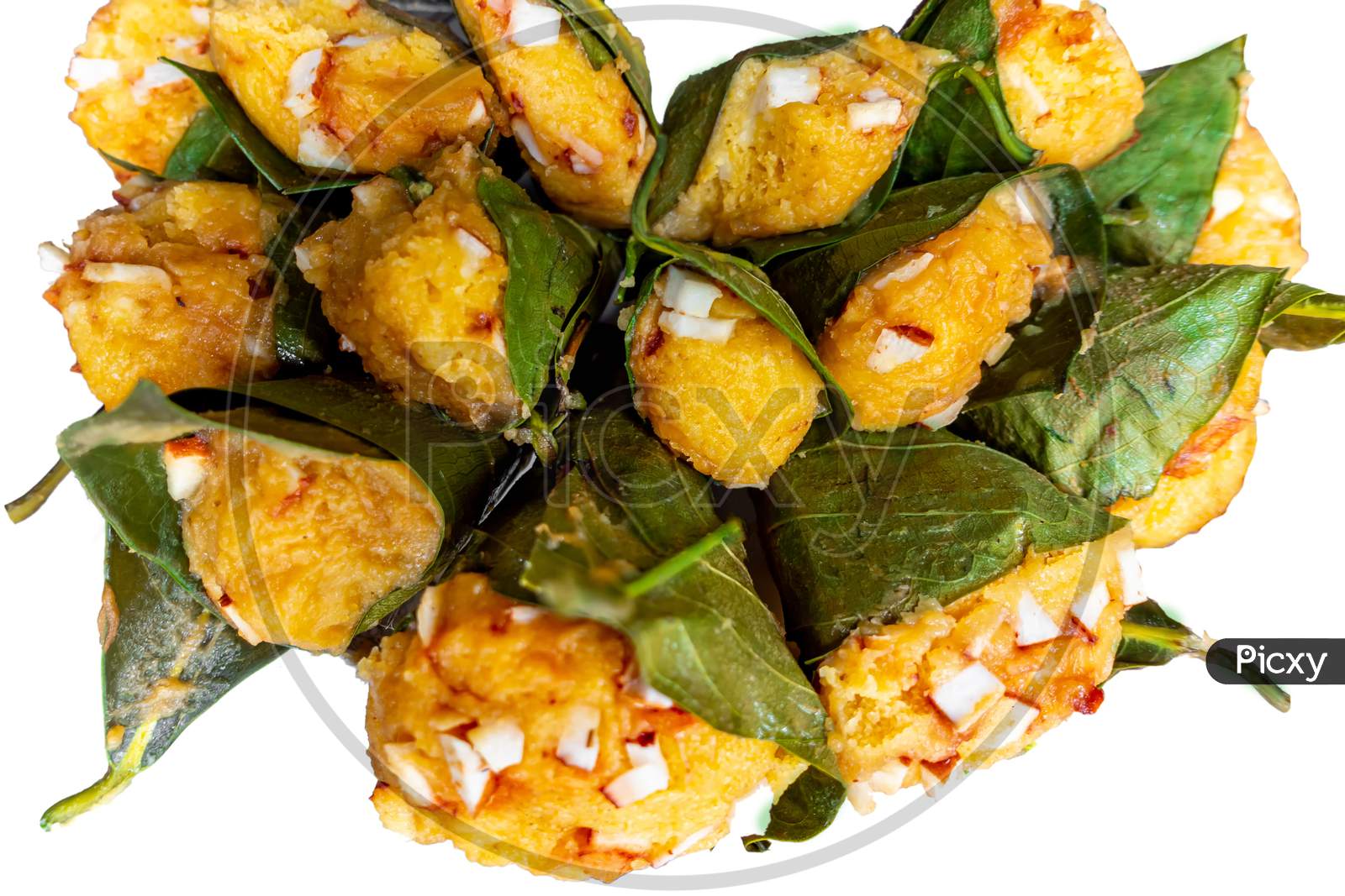 Image of Traditional steamed ripe palmyra palm fruit cake wrapped with ...