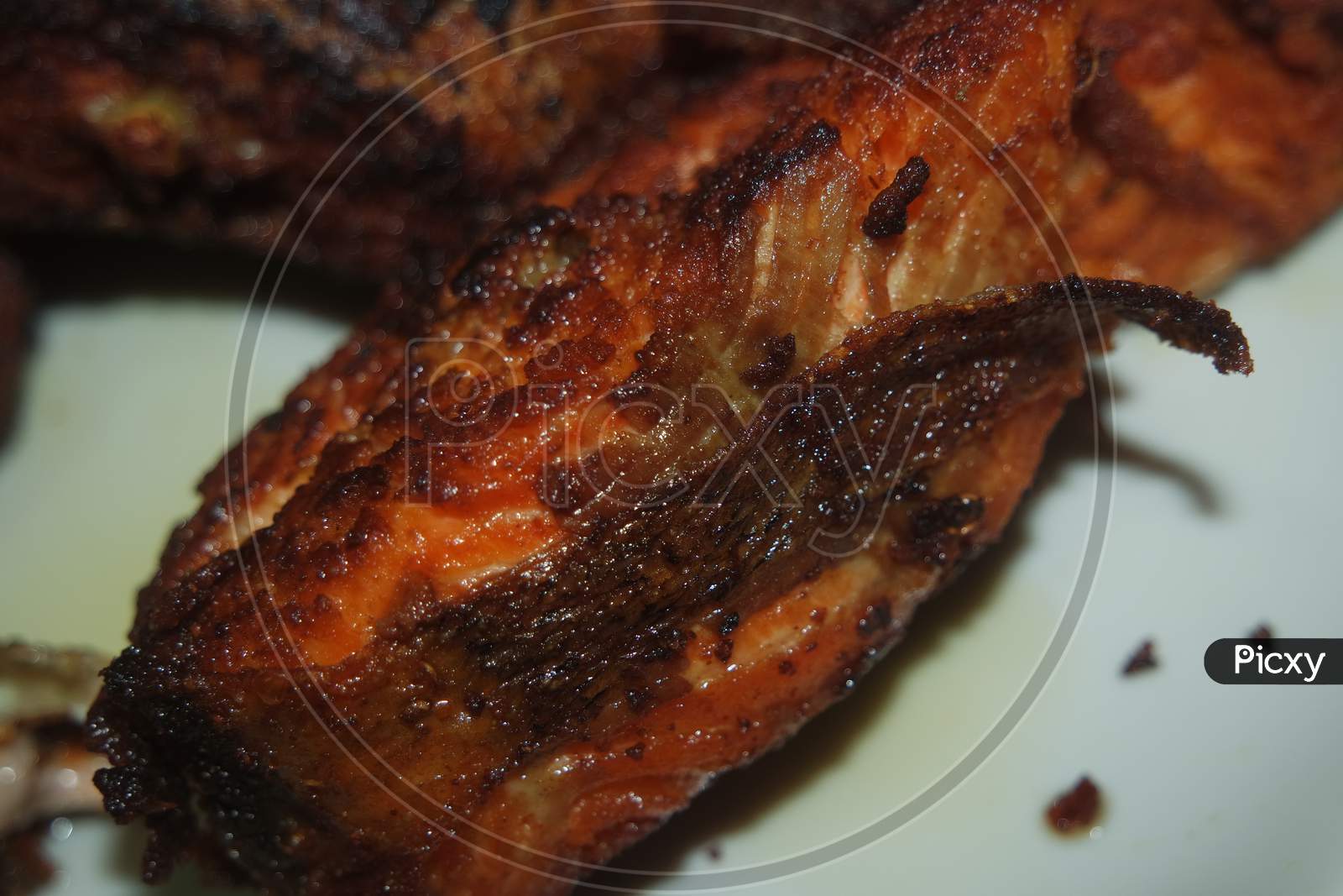 Image of Spicy And Crunchy Barbecue Of Fried Fish Fillet On A White ...
