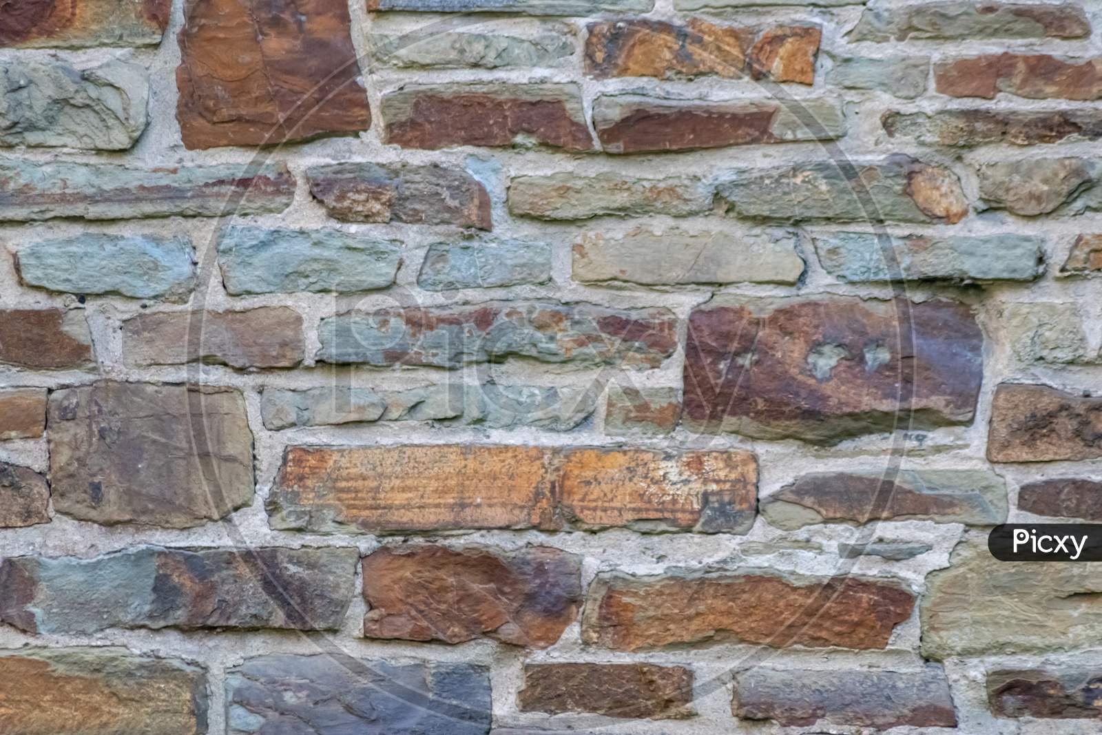 Image of Massive stone wall with rough rocks like a castle wall with ...