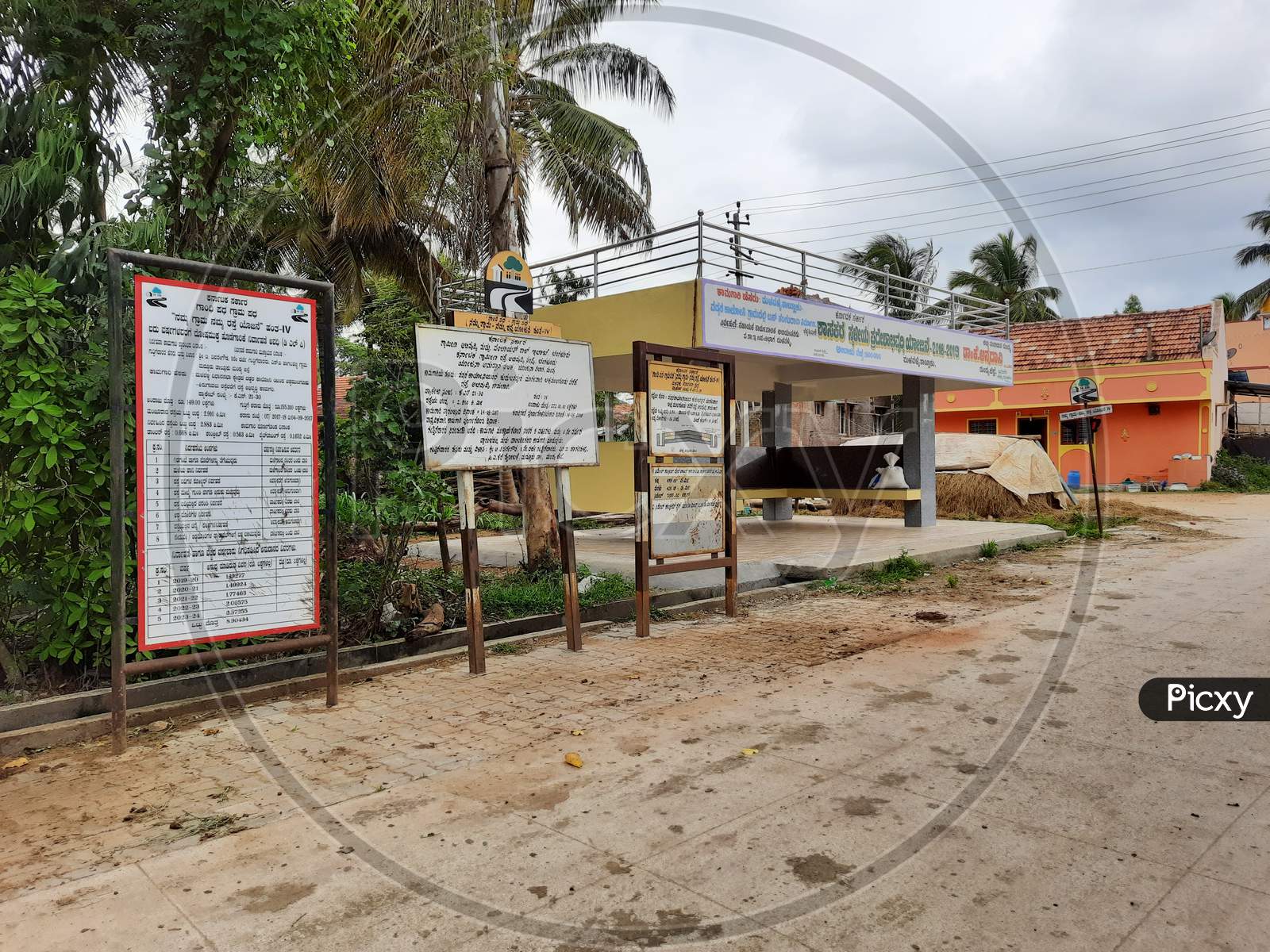 Image of Closeup Of Indian Village Super Bus Stop And Concrete Road ...