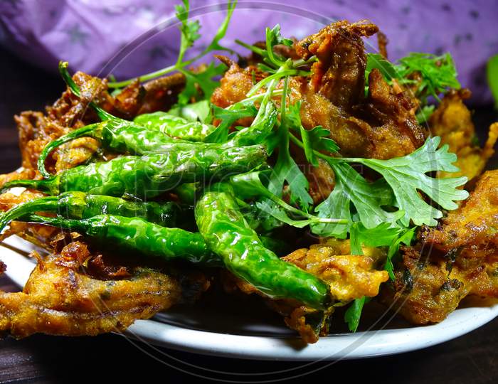 Image of Fresh indian snack spicy onion fritters. pakoda. on white ...