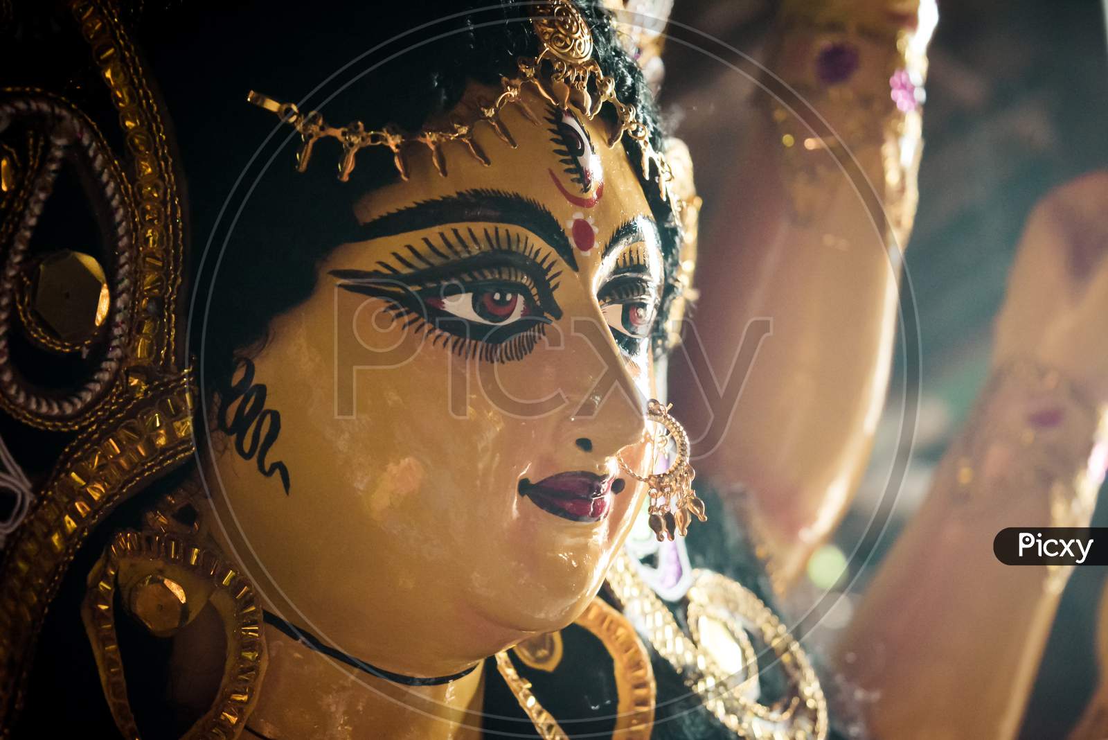 Image of Close Up Side View Face Of Goddess Maa Durga Idol. A Symbol Of ...