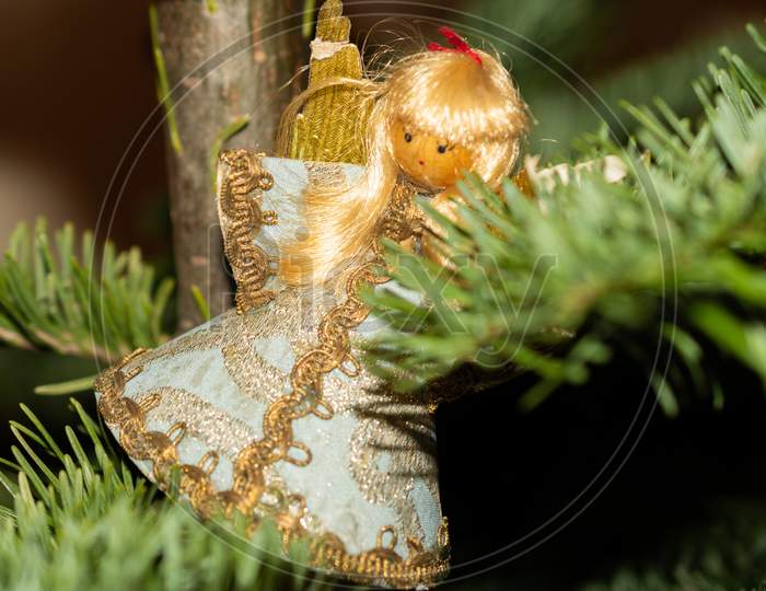 Image of Little Angel Figure On A Christmas Tree-DJ180250-Picxy